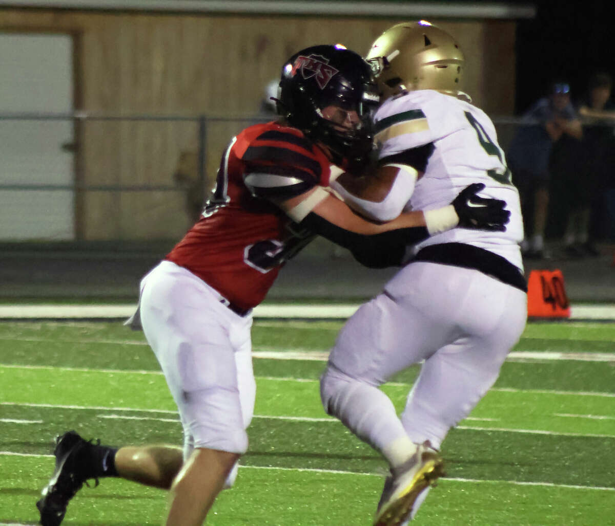 Qualls, Ackerman combine for seven touchdowns in Triad’s rout