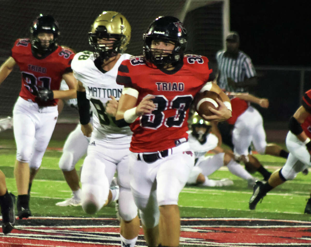 Qualls, Ackerman combine for seven touchdowns in Triad’s rout