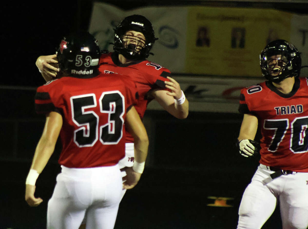 Qualls, Ackerman combine for seven touchdowns in Triad’s rout