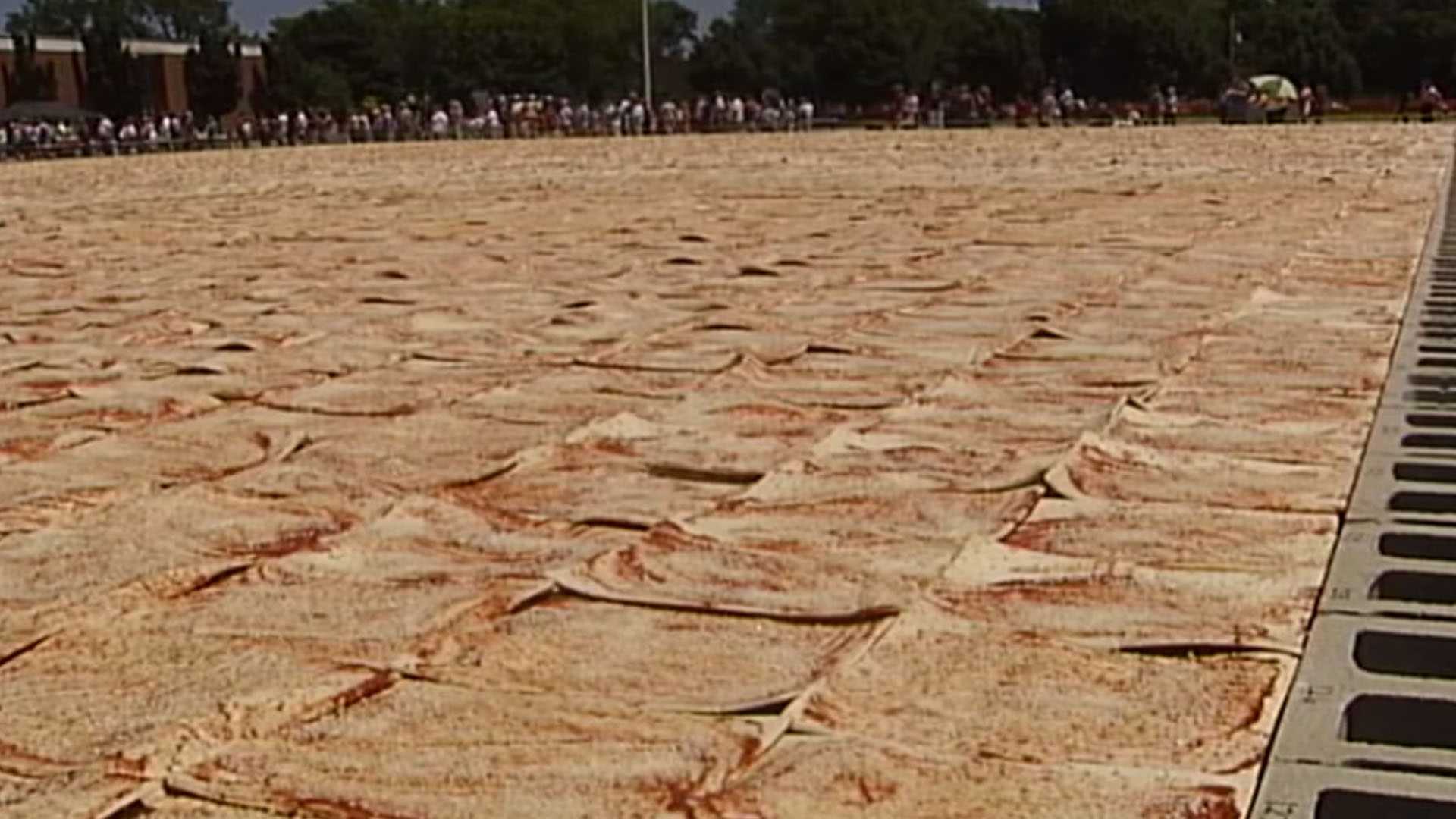 RETRO FIND: Community baked pizza twice the size of a basketball court