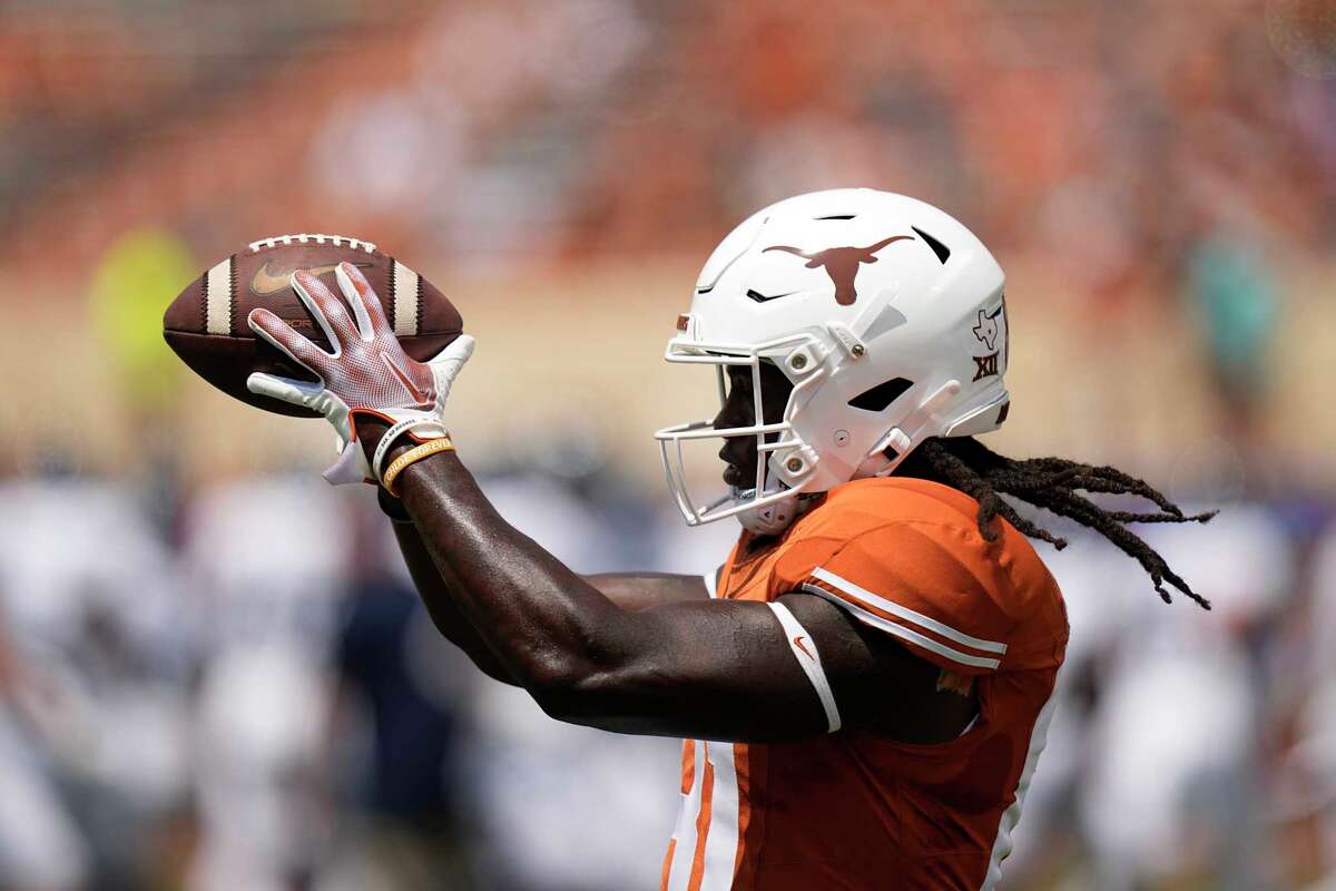 No. 11 Texas overcomes slow start to beat Rice in season opener