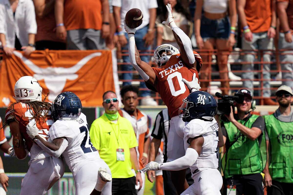 No. 11 Texas overcomes slow start to beat Rice in season opener