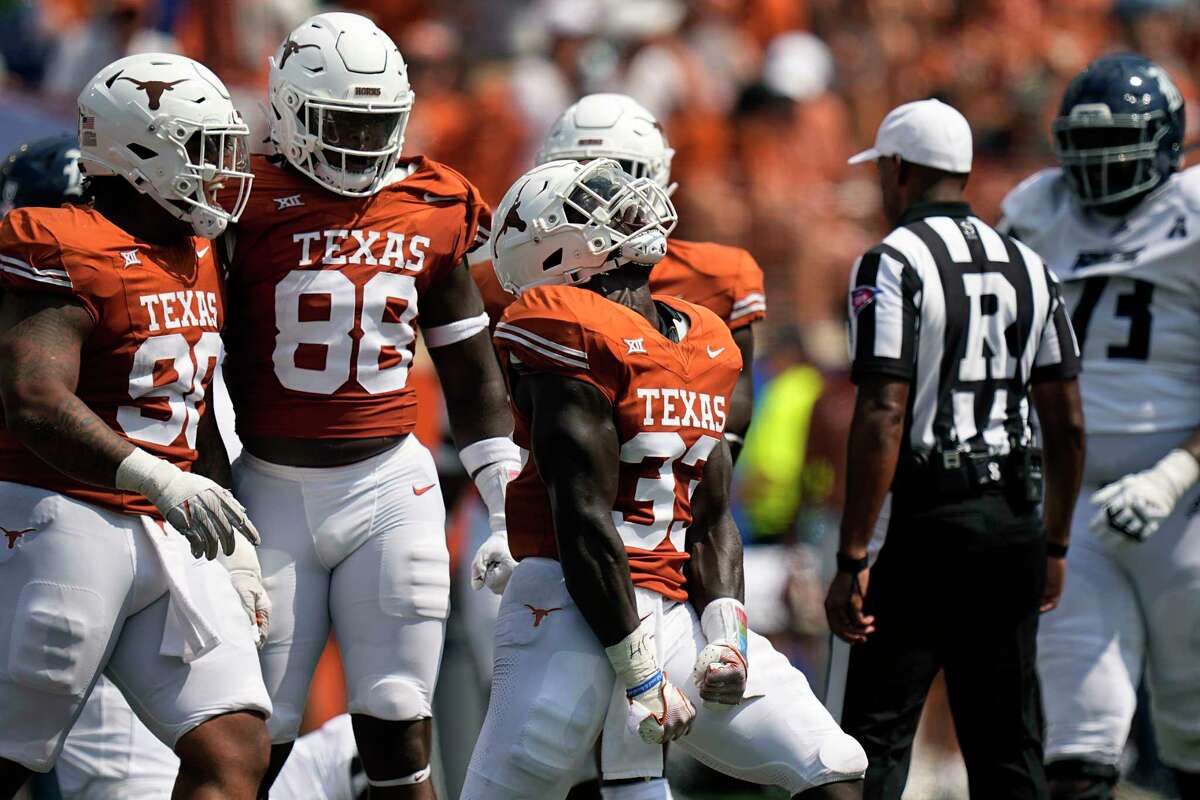 No. 11 Texas overcomes slow start to beat Rice in season opener
