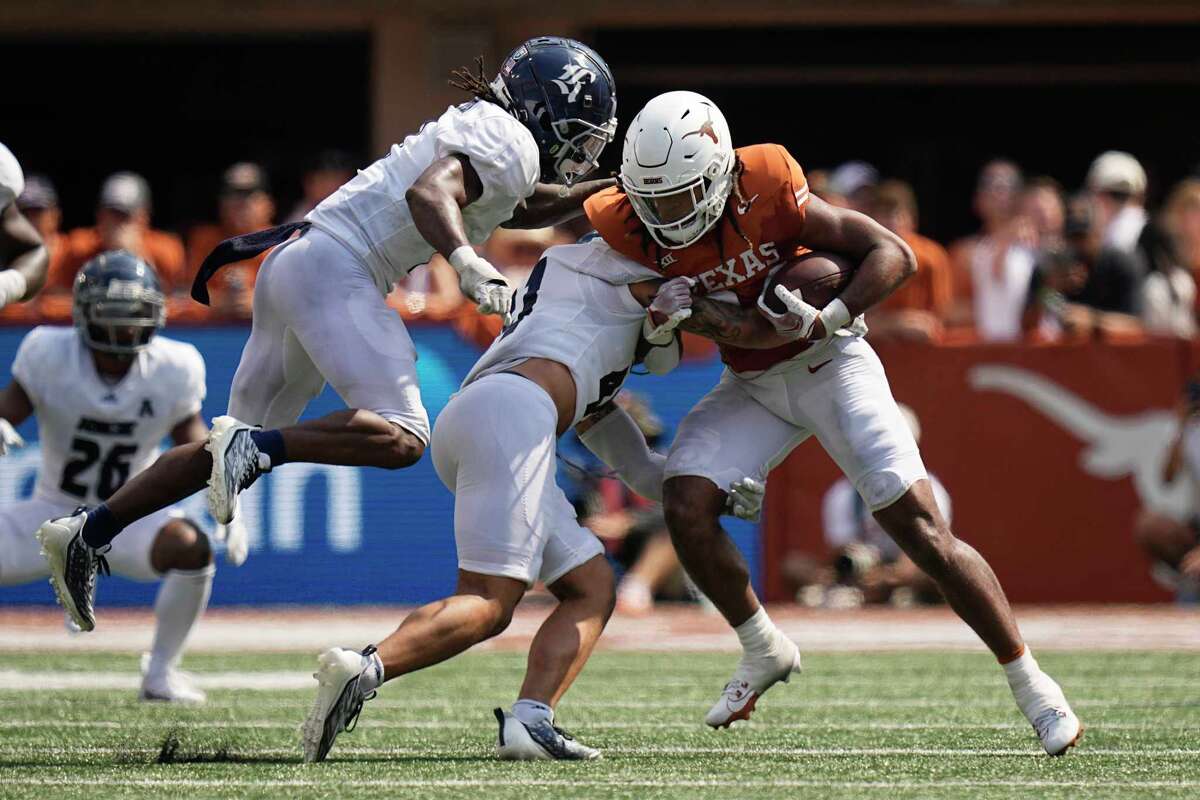 No. 11 Texas overcomes slow start to beat Rice in season opener