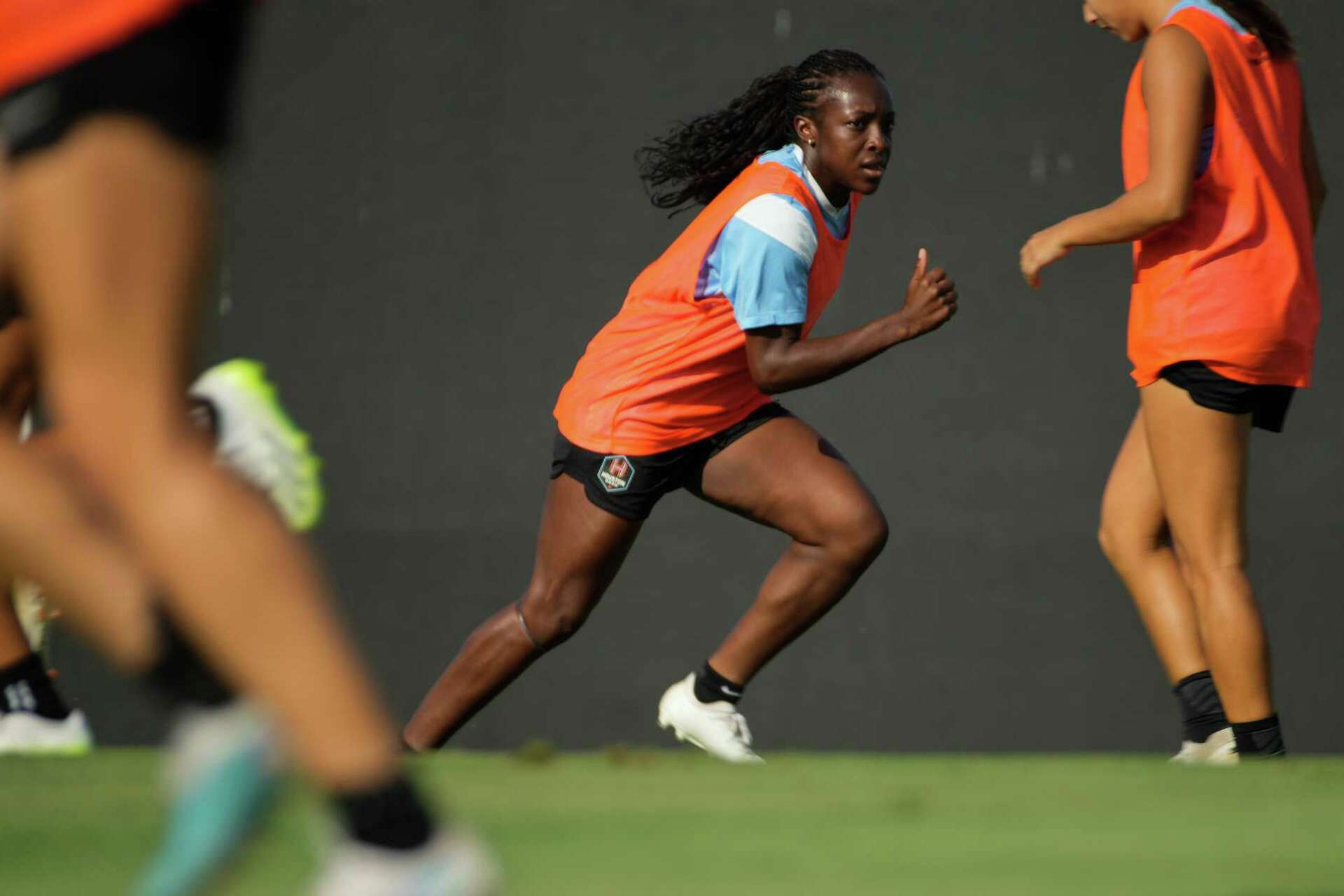 Houston Dash's Michelle Alozie balances soccer, cancer research