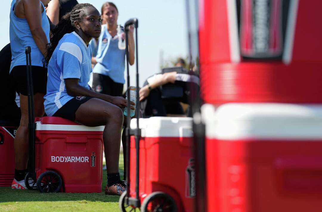 Houston Dash's Michelle Alozie balances soccer, cancer research