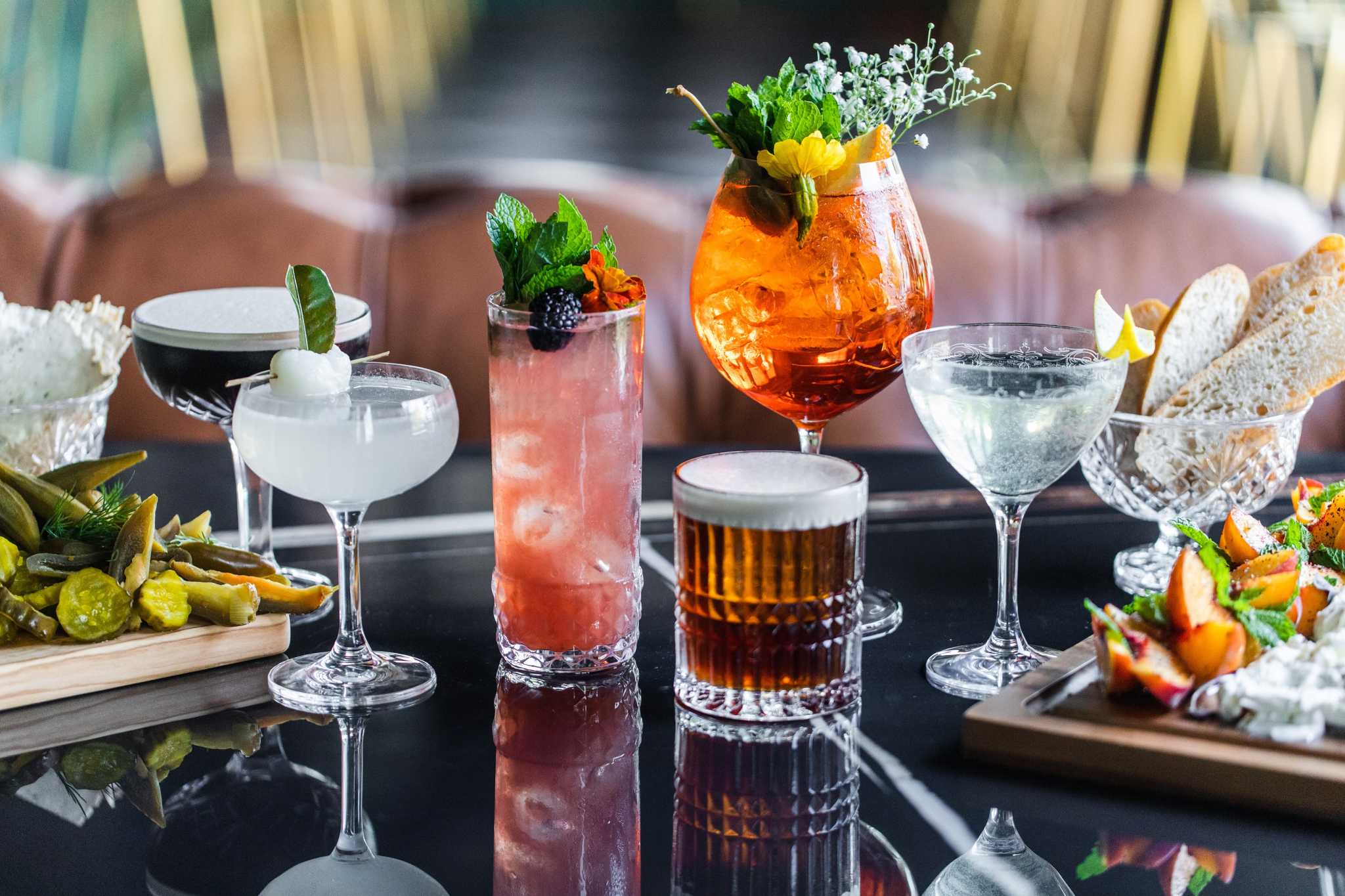 11th Street in the Heights lights up with new elevated cocktail bar