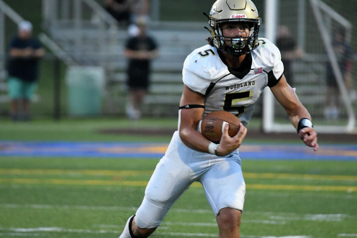 Holy Cross defeats Woodland in CT high school football opener