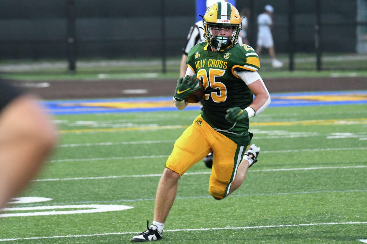 Holy Cross defeats Woodland in CT high school football opener