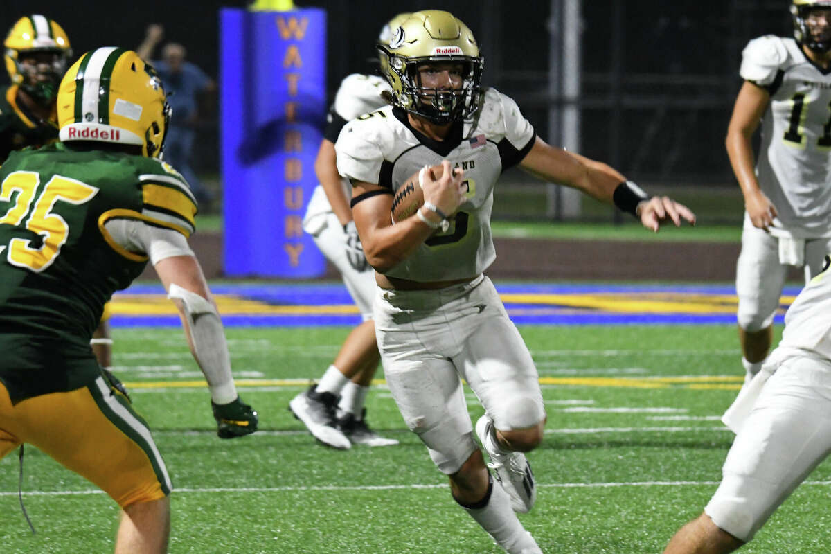 Holy Cross defeats Woodland in CT high school football opener