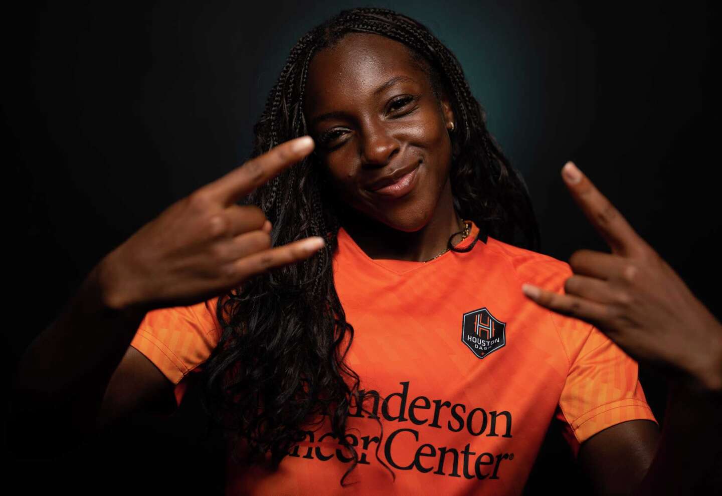 Houston Dash's Michelle Alozie balances soccer, cancer research
