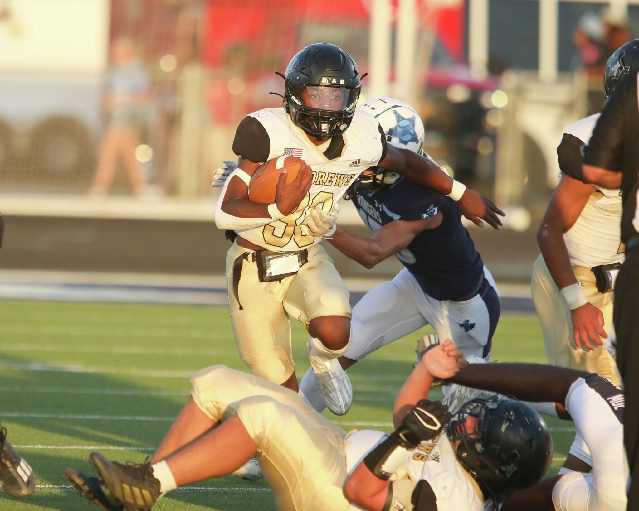 HS FOOTBALL: Run game, defense key Andrews past Greenwood