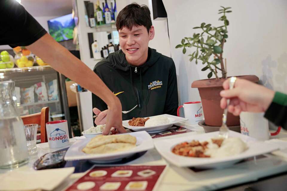 His country’s first D-I athlete, USF’s 'Mongolian Mike’ near NBA dream