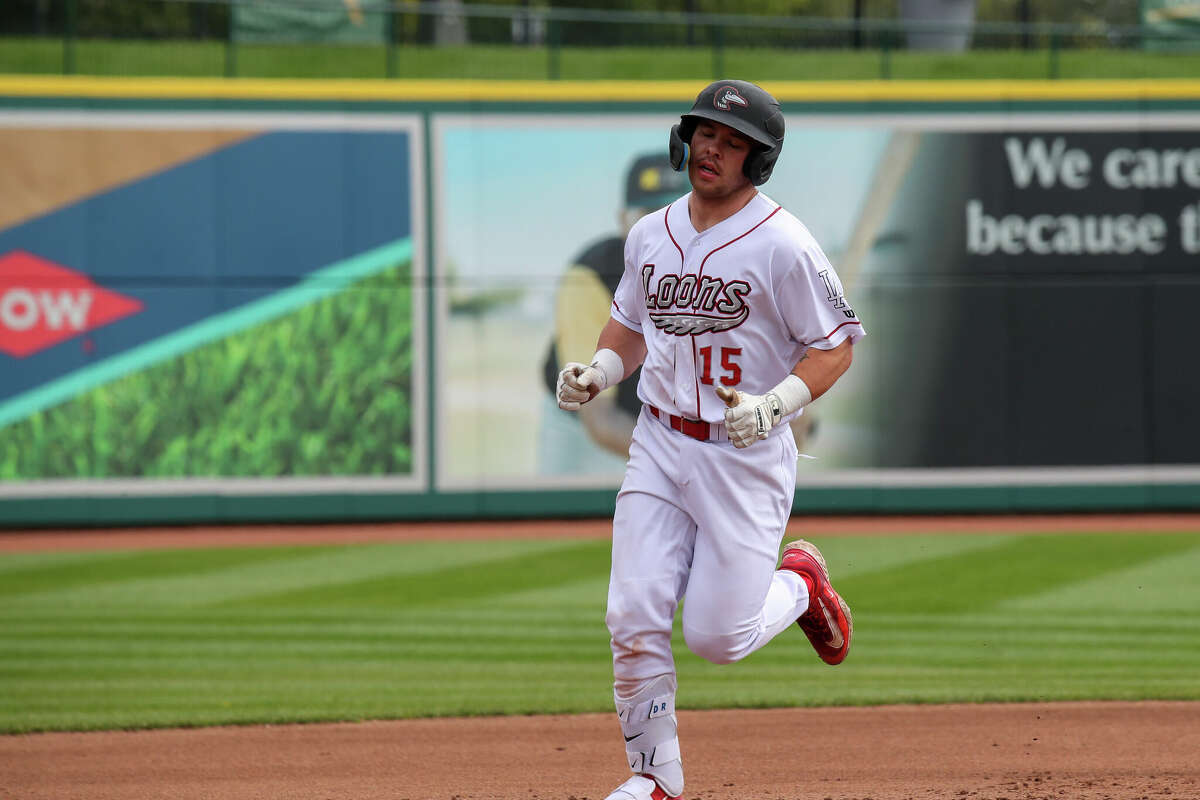Rushing hits three-run homer in second and two-run homer in fourth