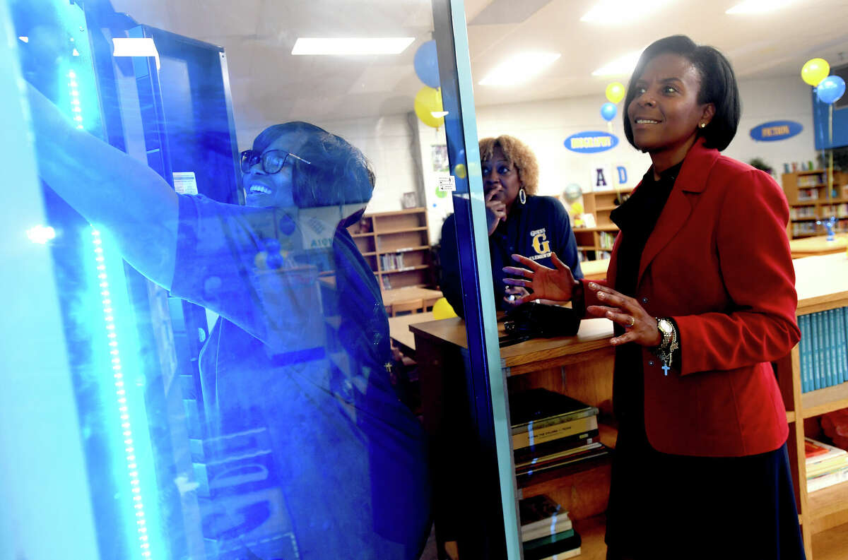 Entergy powers up United Way book vending machine initiative