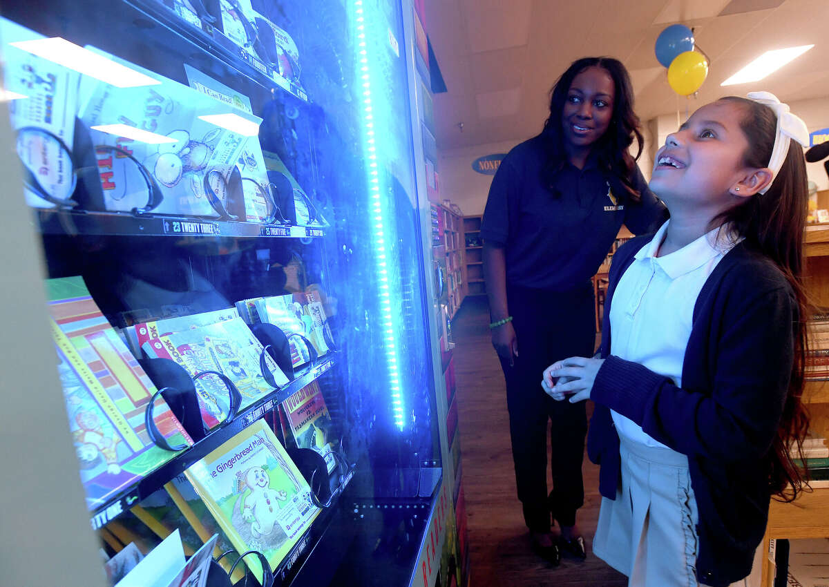 Entergy powers up United Way book vending machine initiative