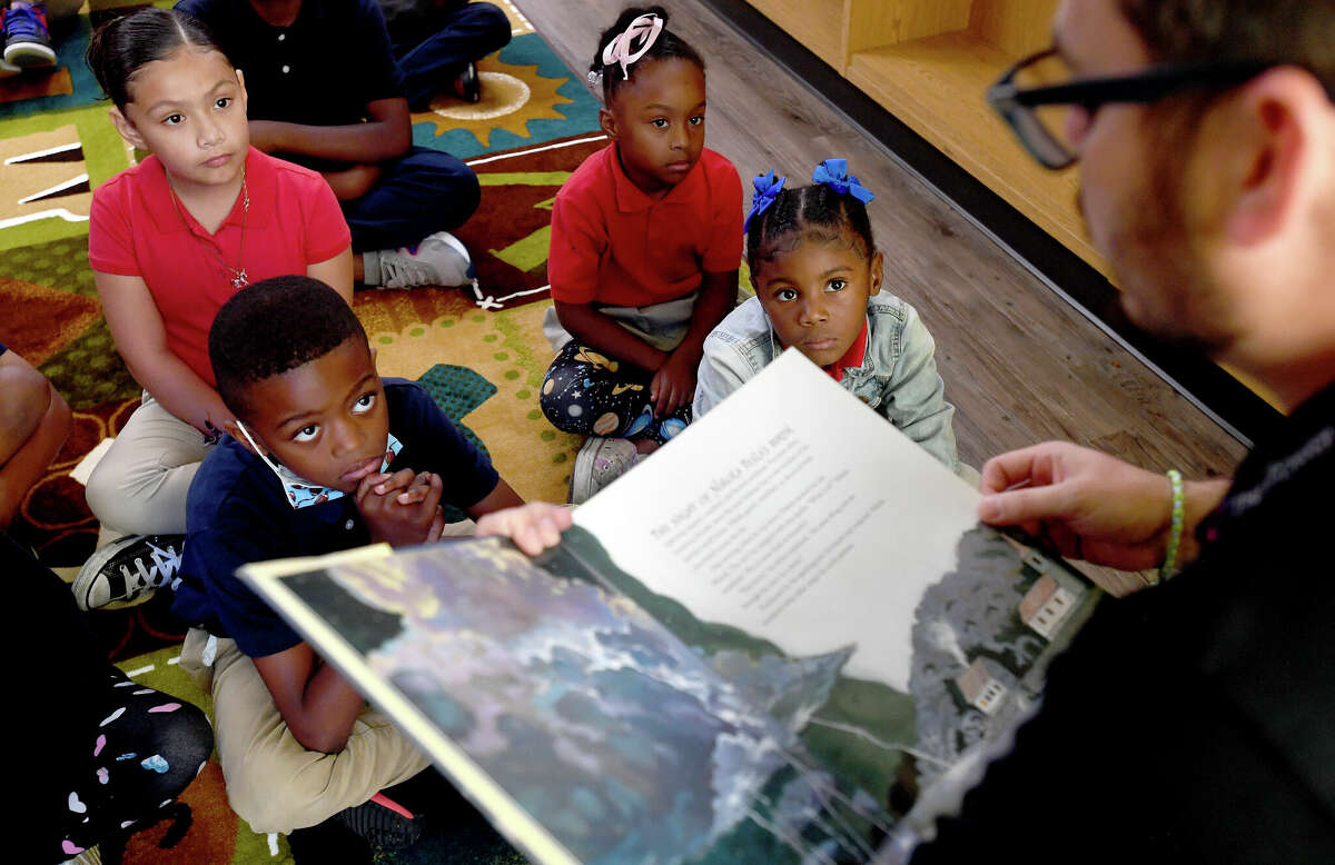 Entergy powers up United Way book vending machine initiative
