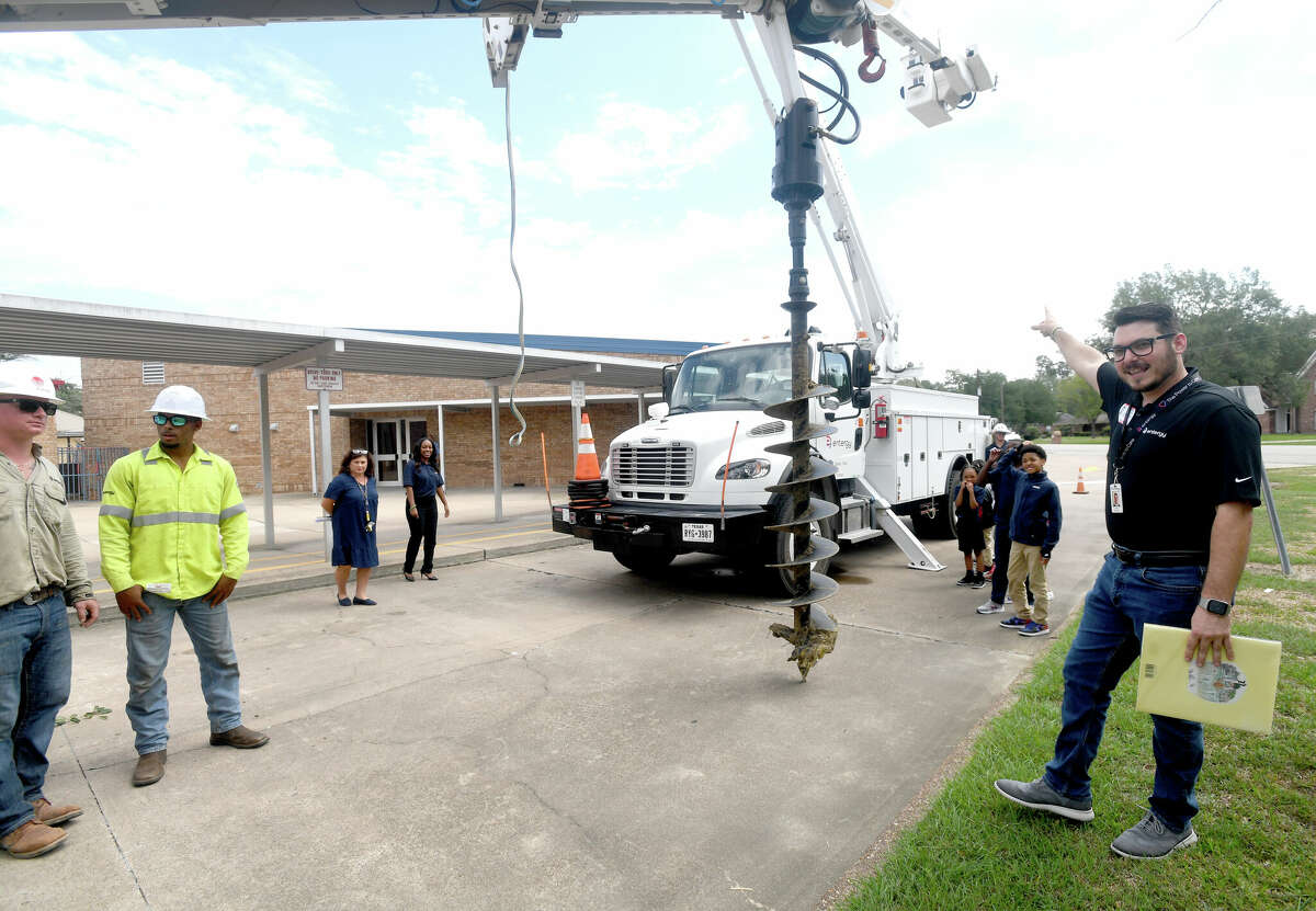 Entergy powers up United Way book vending machine initiative