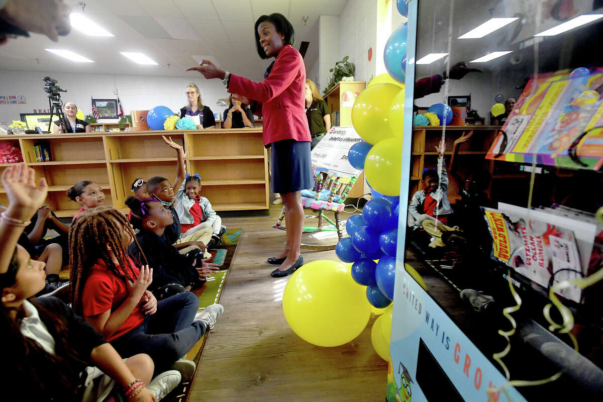 Entergy powers up United Way book vending machine initiative
