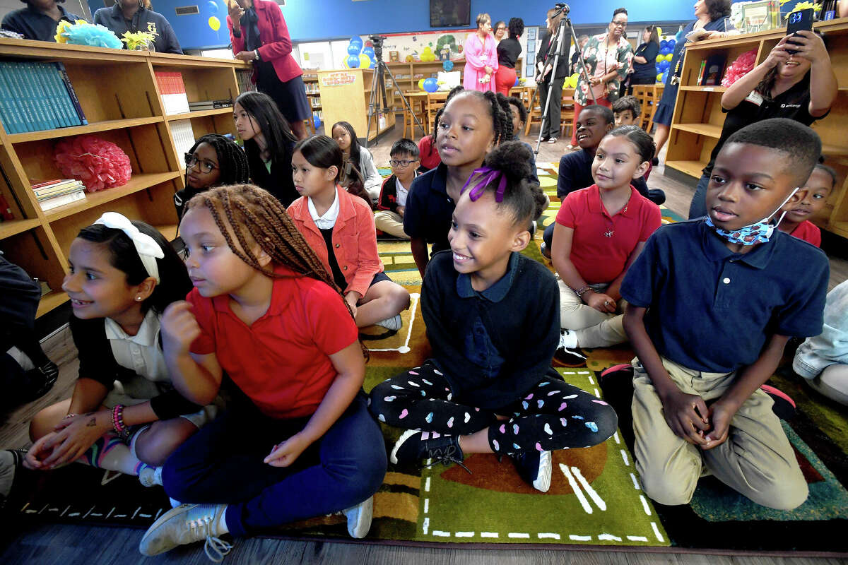 Entergy powers up United Way book vending machine initiative