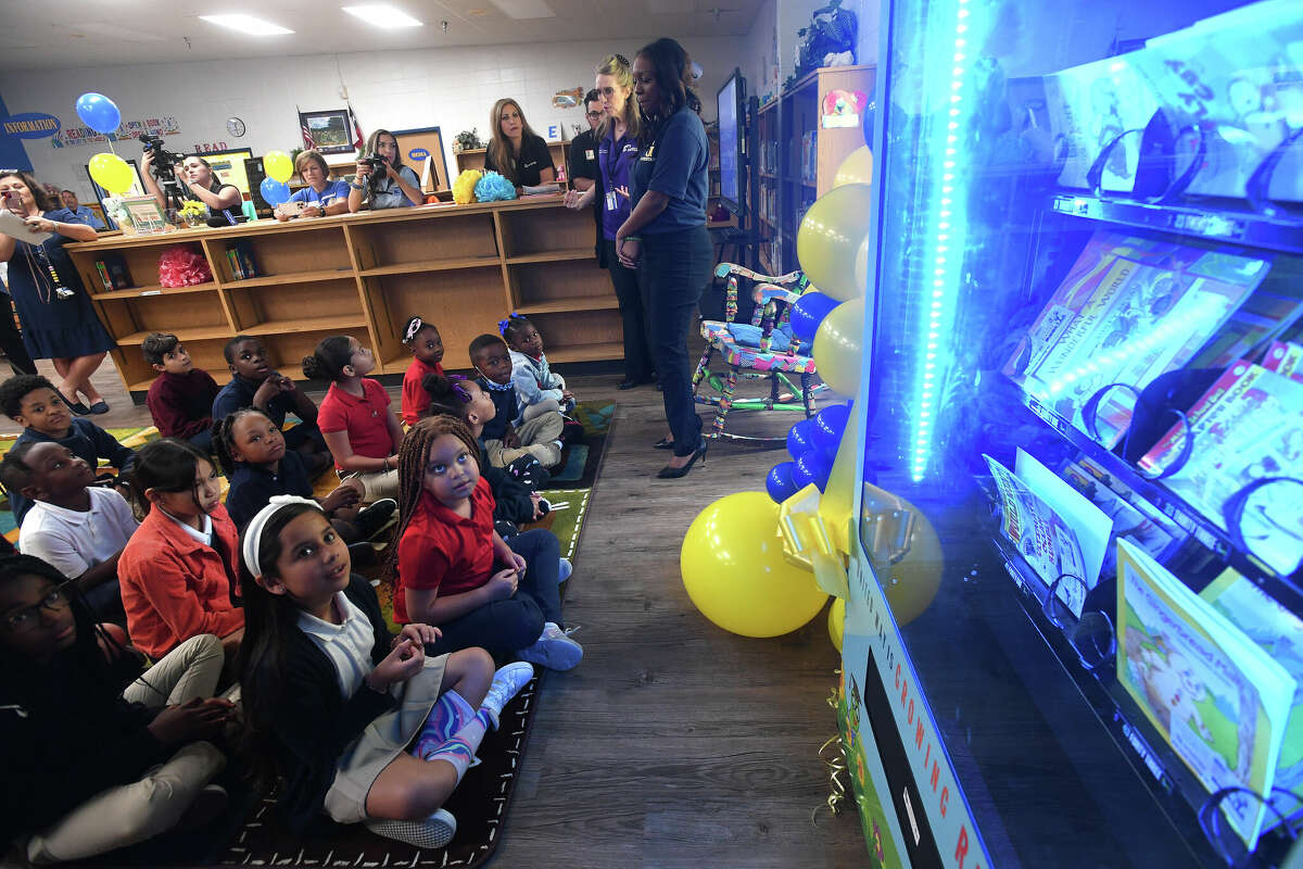 Entergy powers up United Way book vending machine initiative