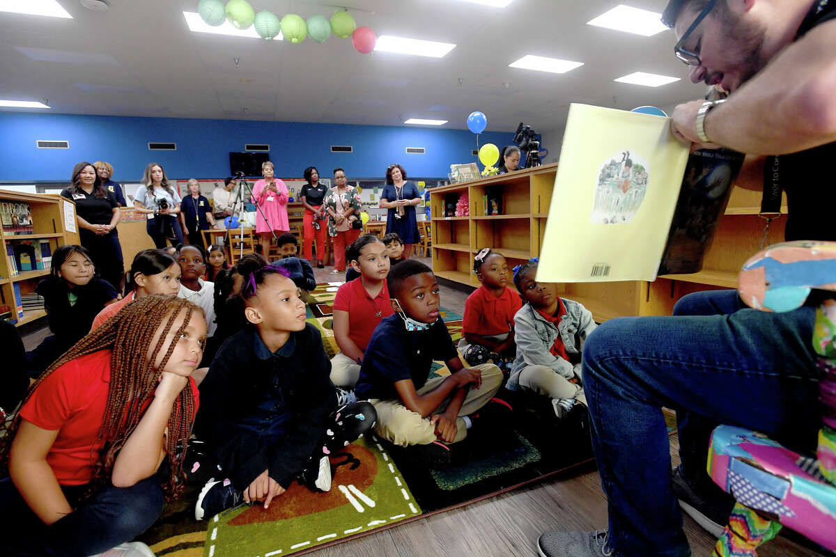 Entergy powers up United Way book vending machine initiative