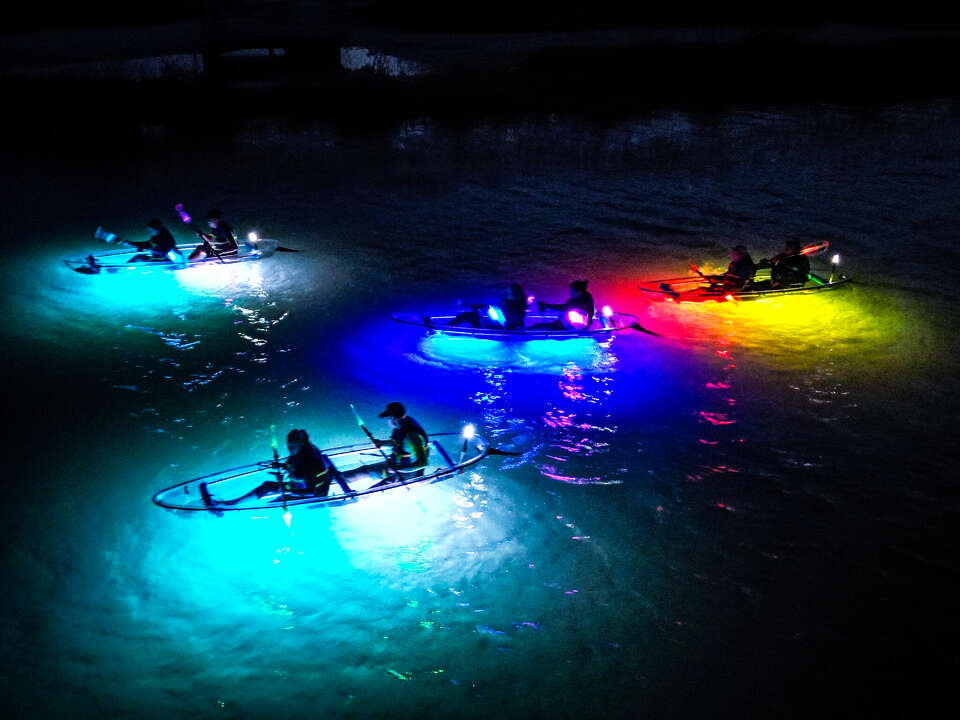 Glow in the dark kayaking at this Texas lake