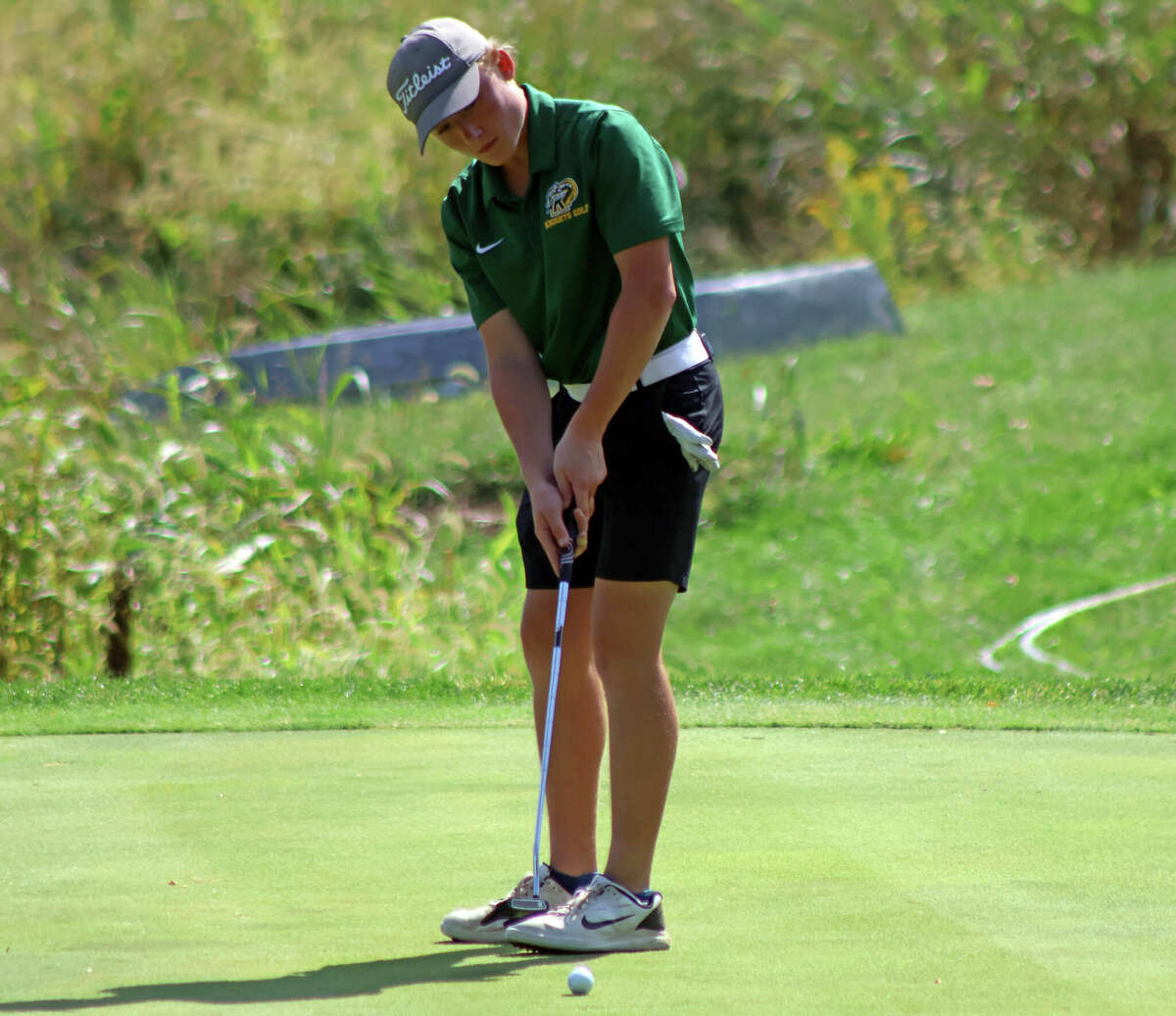 Knights win regional titles; Griffins advance four golfers