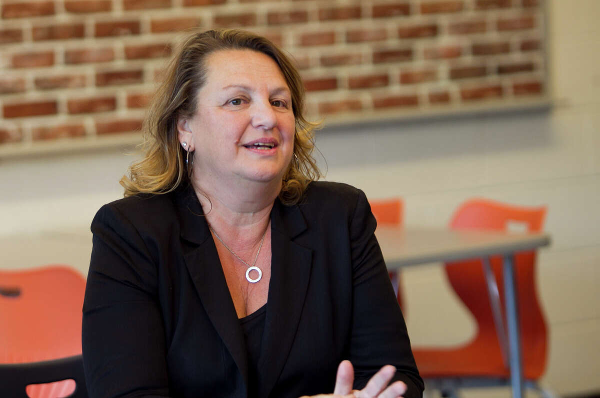 Greenwich woman 'happiest human' teaching with her adult kids