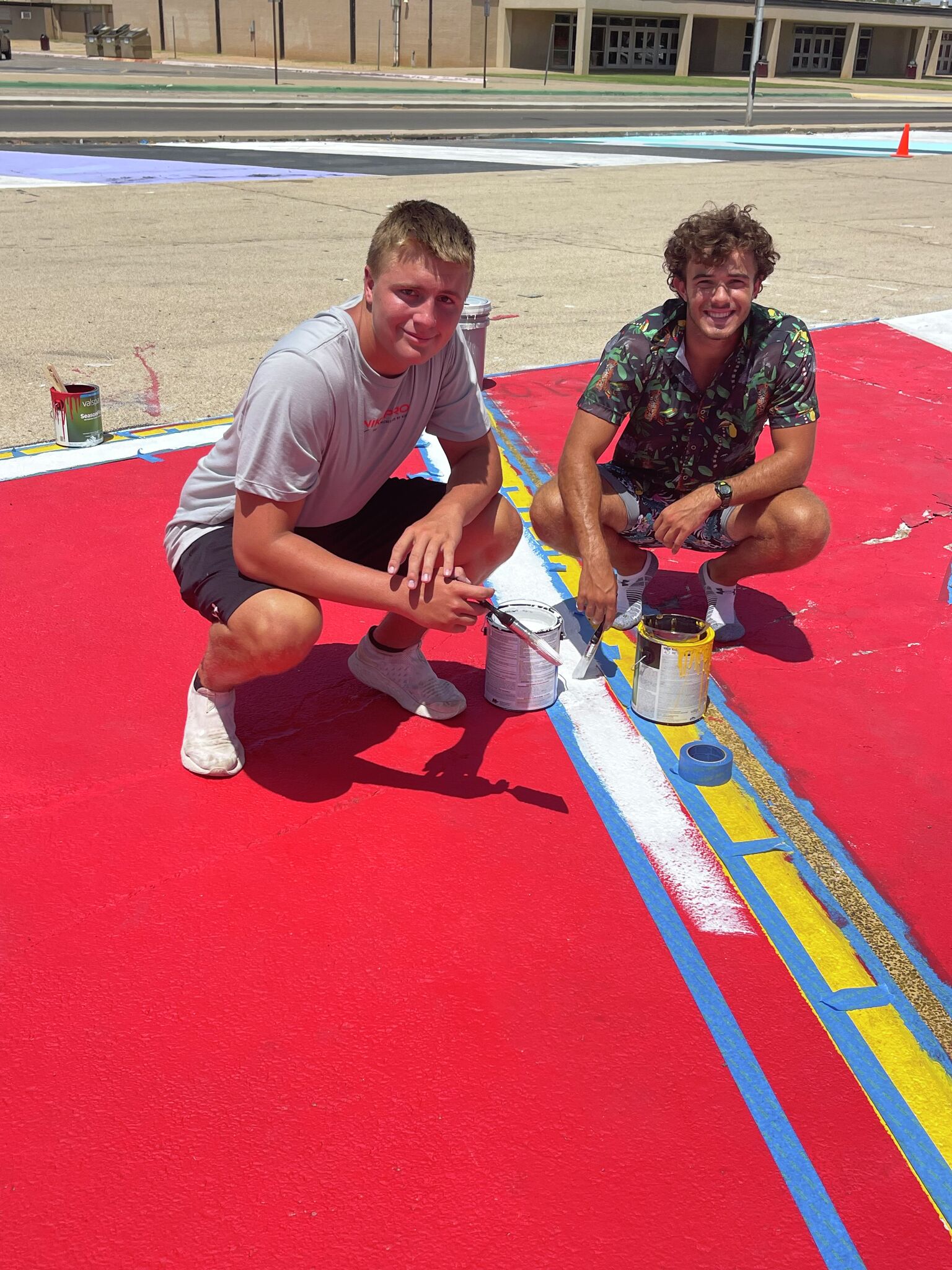 High School seniors around Midland, Texas, paint their parking spaces