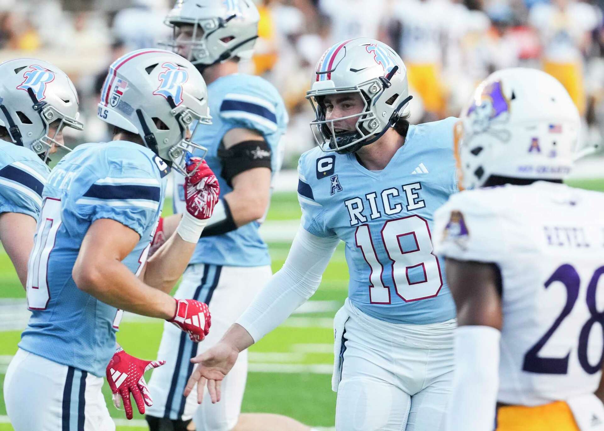 Rice football wearing Houston Oilers color on jerseys against UTSA