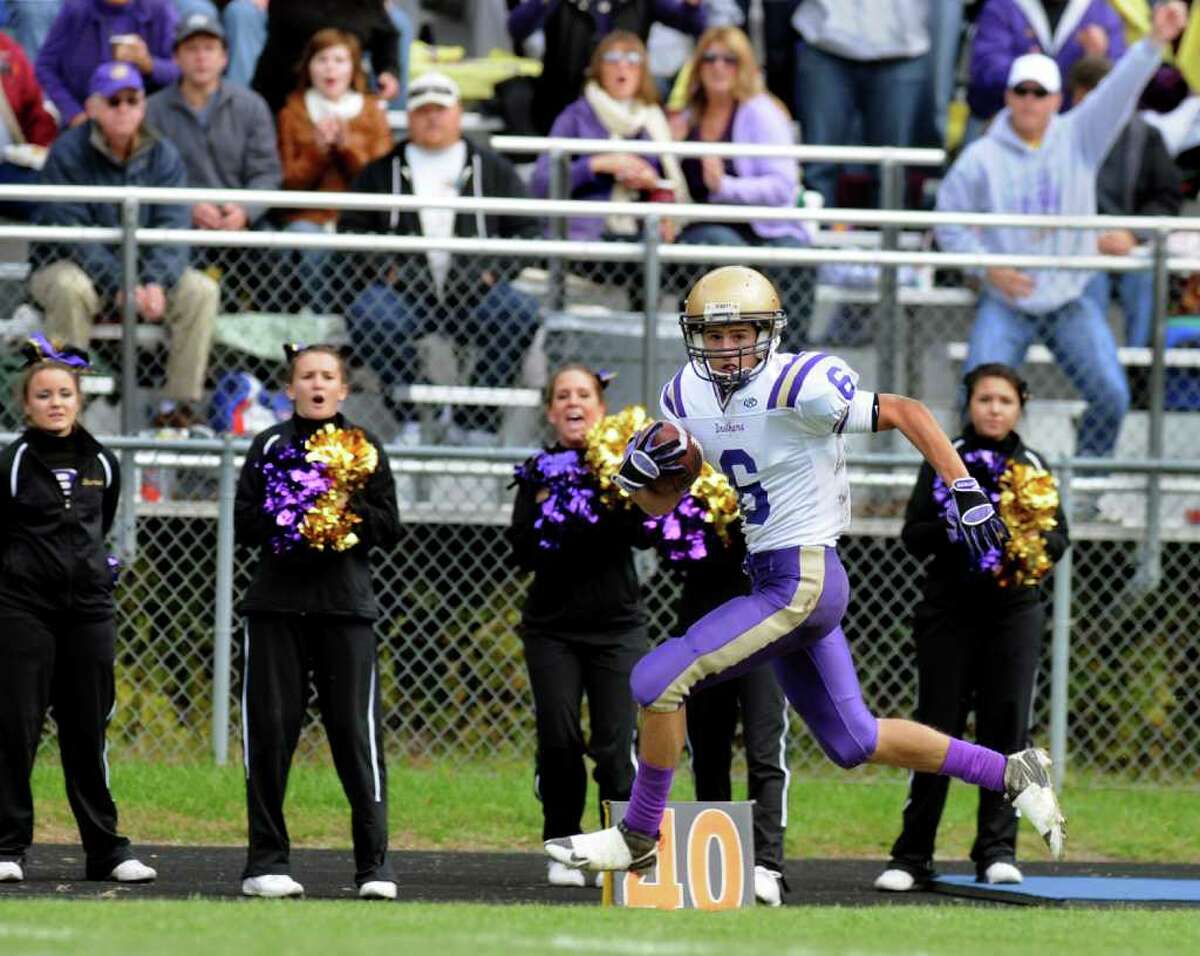 Troy sputters, but advances