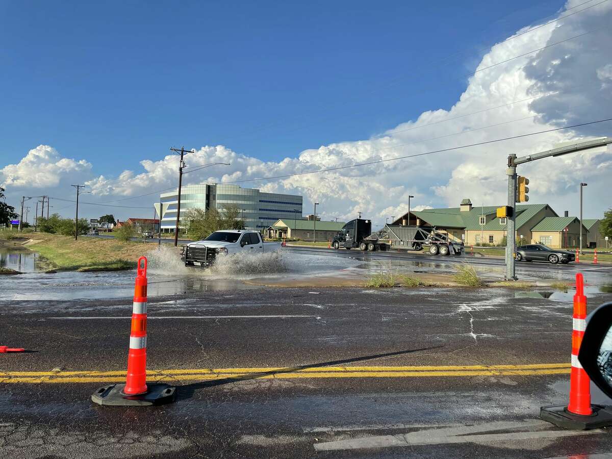 Rain floods downtown Midland, cancels events