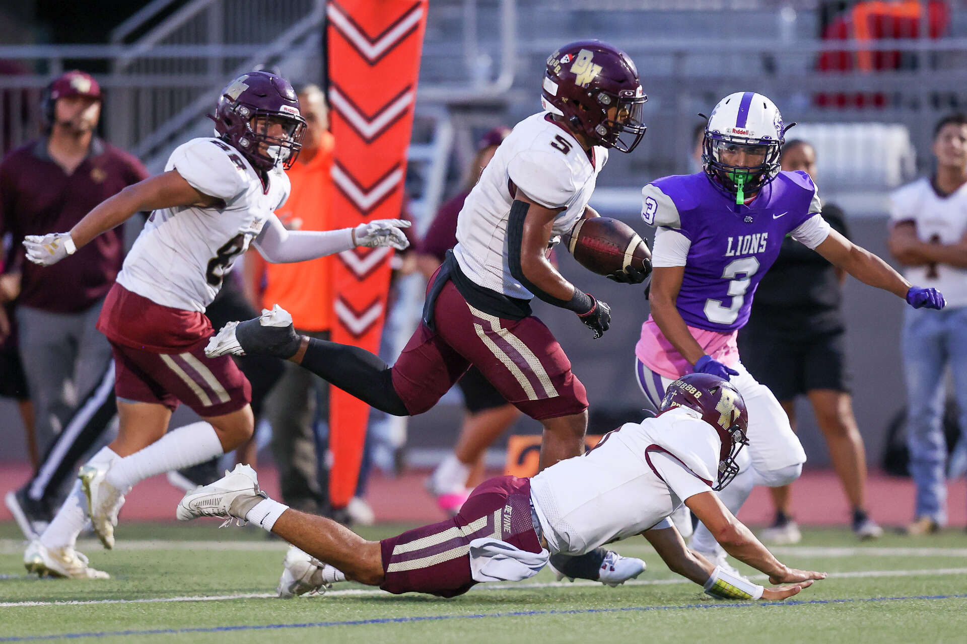 Devine football pulls away in second half to beat YMLA