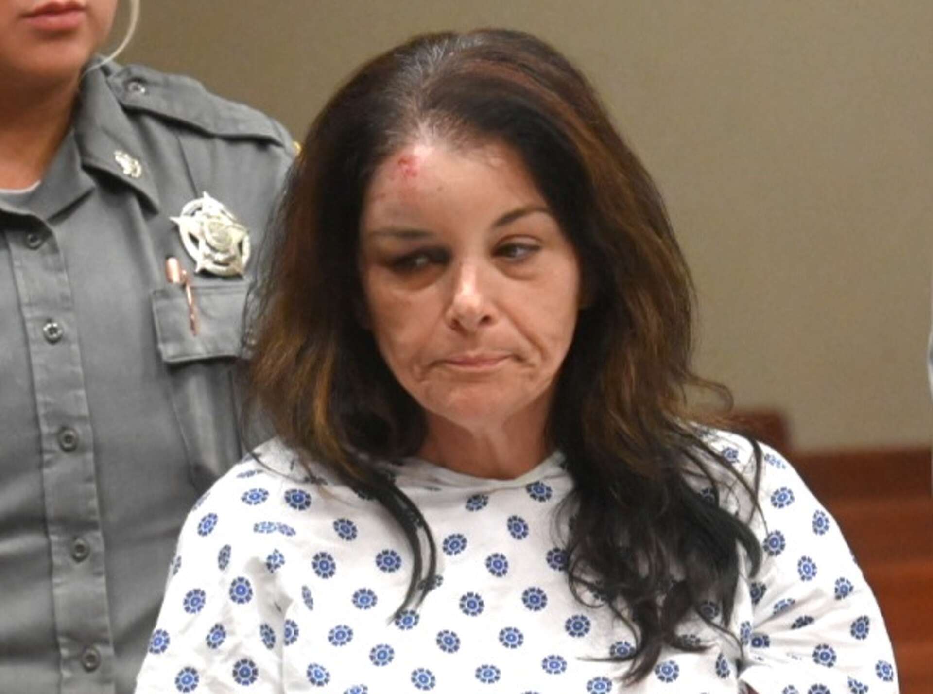 Woman pleads guilty in Bristol police station shooting, records show