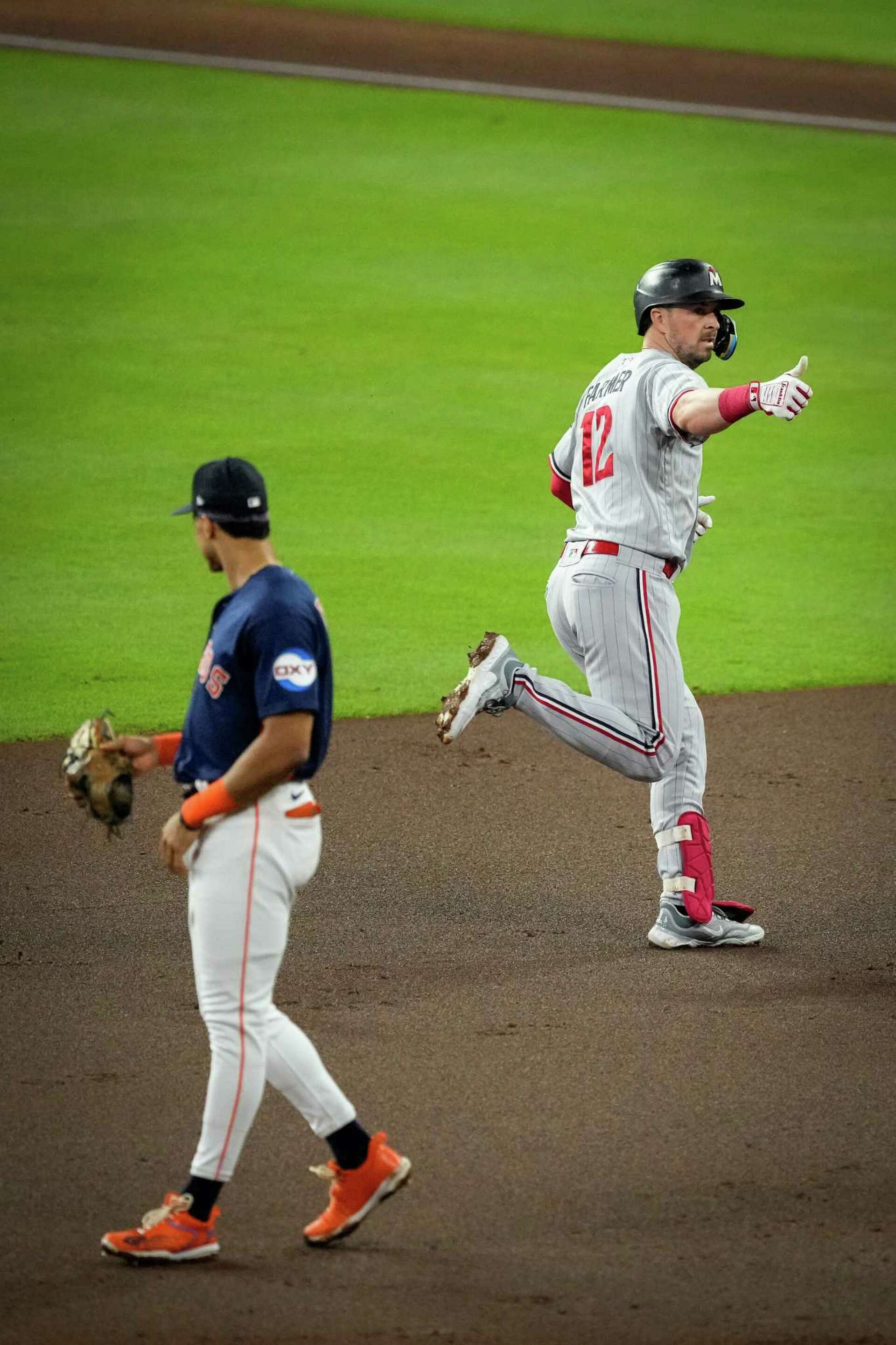 Fans welcome open roof, as long it doesn't rain on Astros on-field win