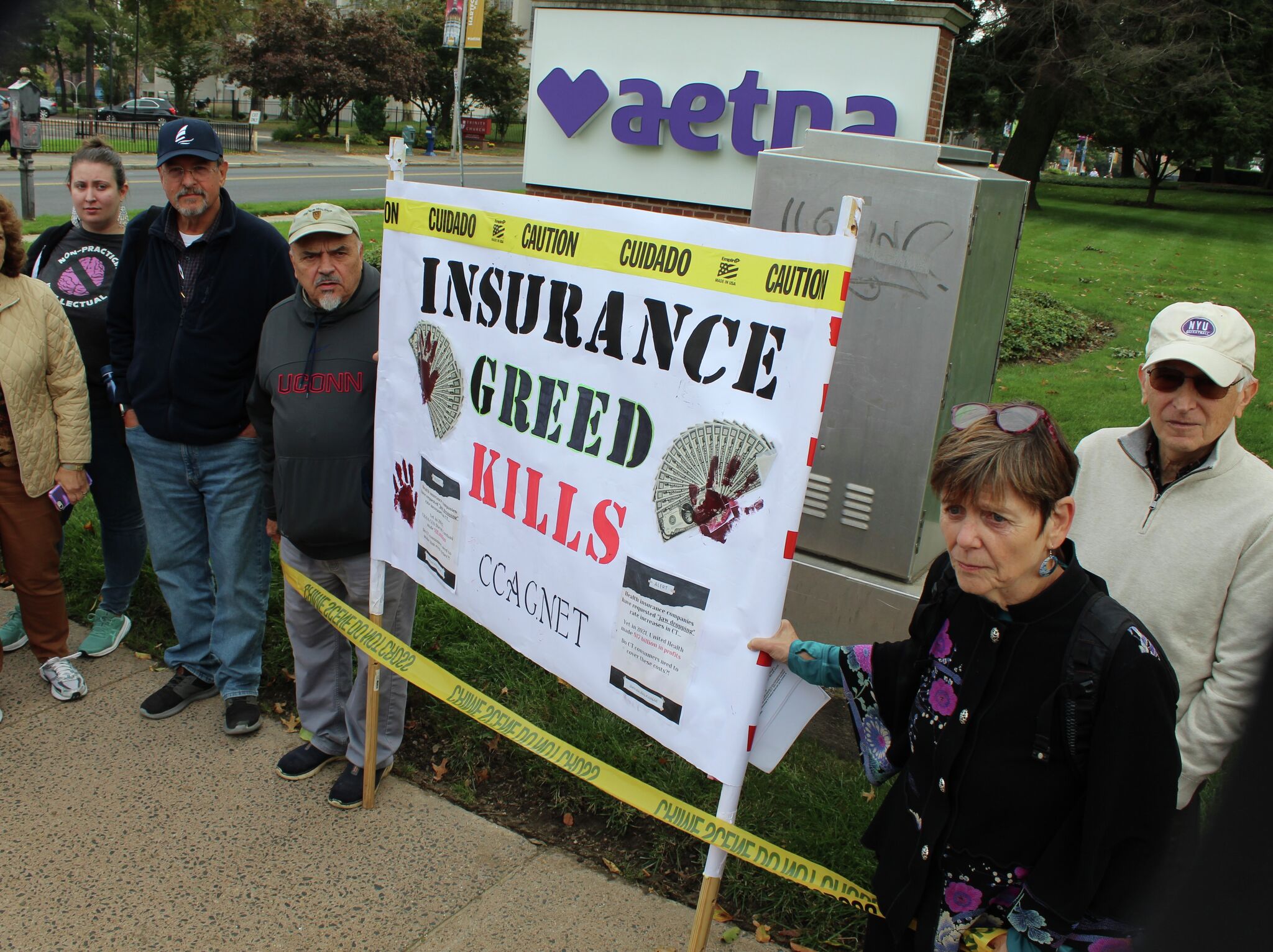 Protesters demand Aetna, UnitedHealth prioritize people over profit