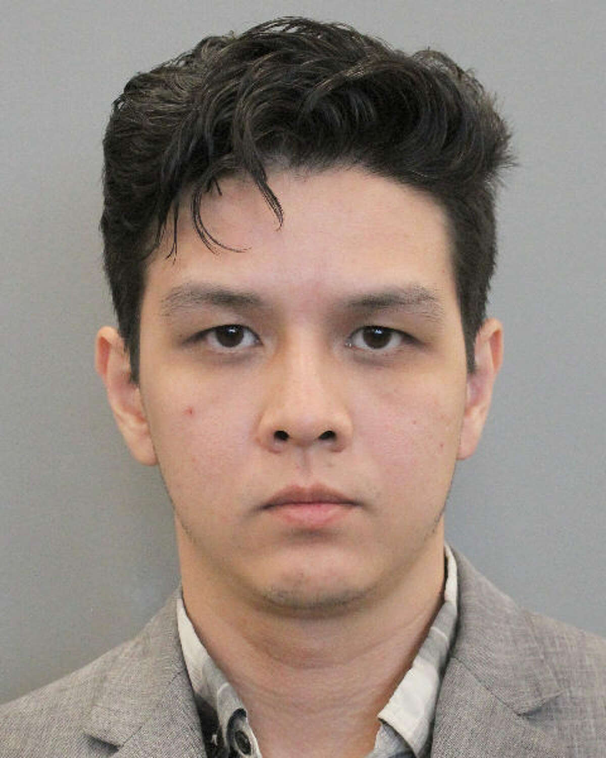 UH lecturer charged with possession of child sex abuse material