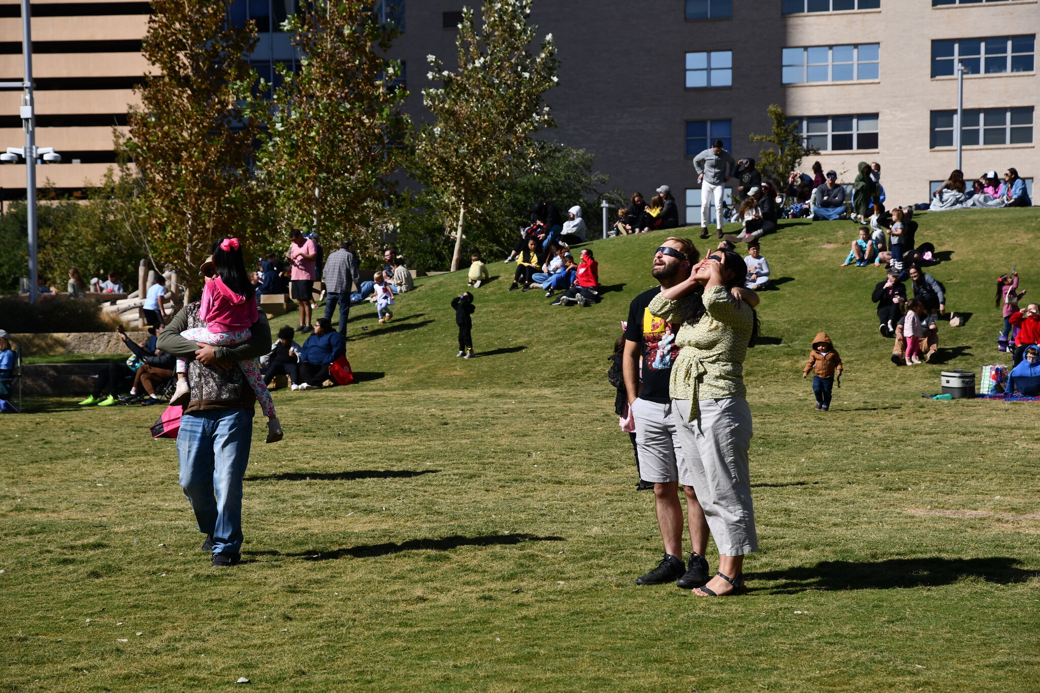 Scenes from annular solar eclipse viewing event at Centennial Park