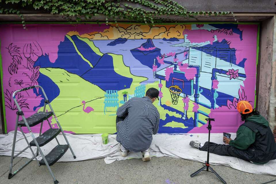 Photos, video: Murals abound at Troy Art Block