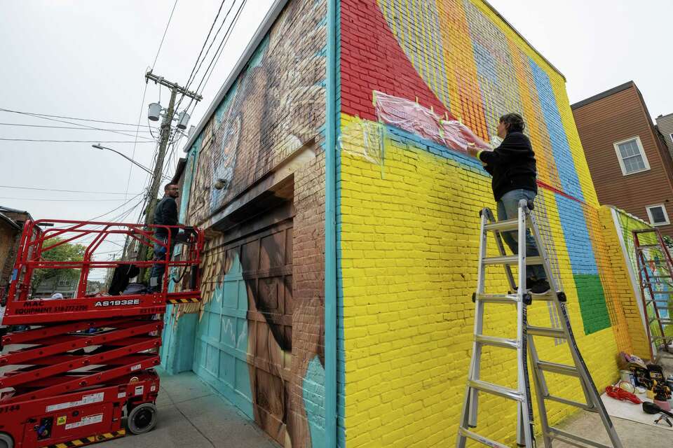 Photos, video: Murals abound at Troy Art Block