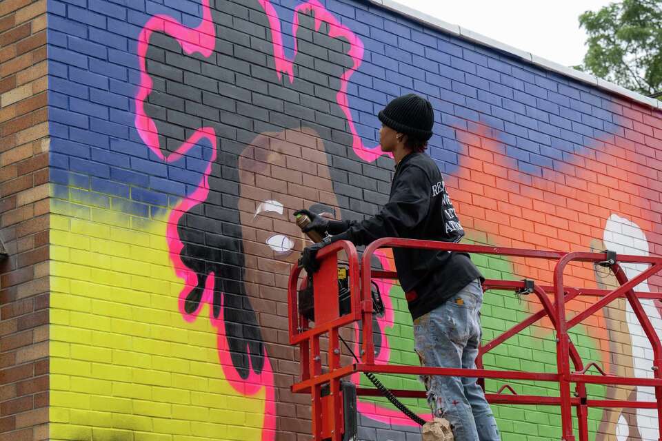 Photos, video: Murals abound at Troy Art Block