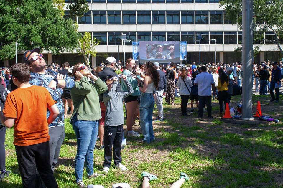 Houstonians marvel at 'ring of fire' eclipse at Johnson Space Center'