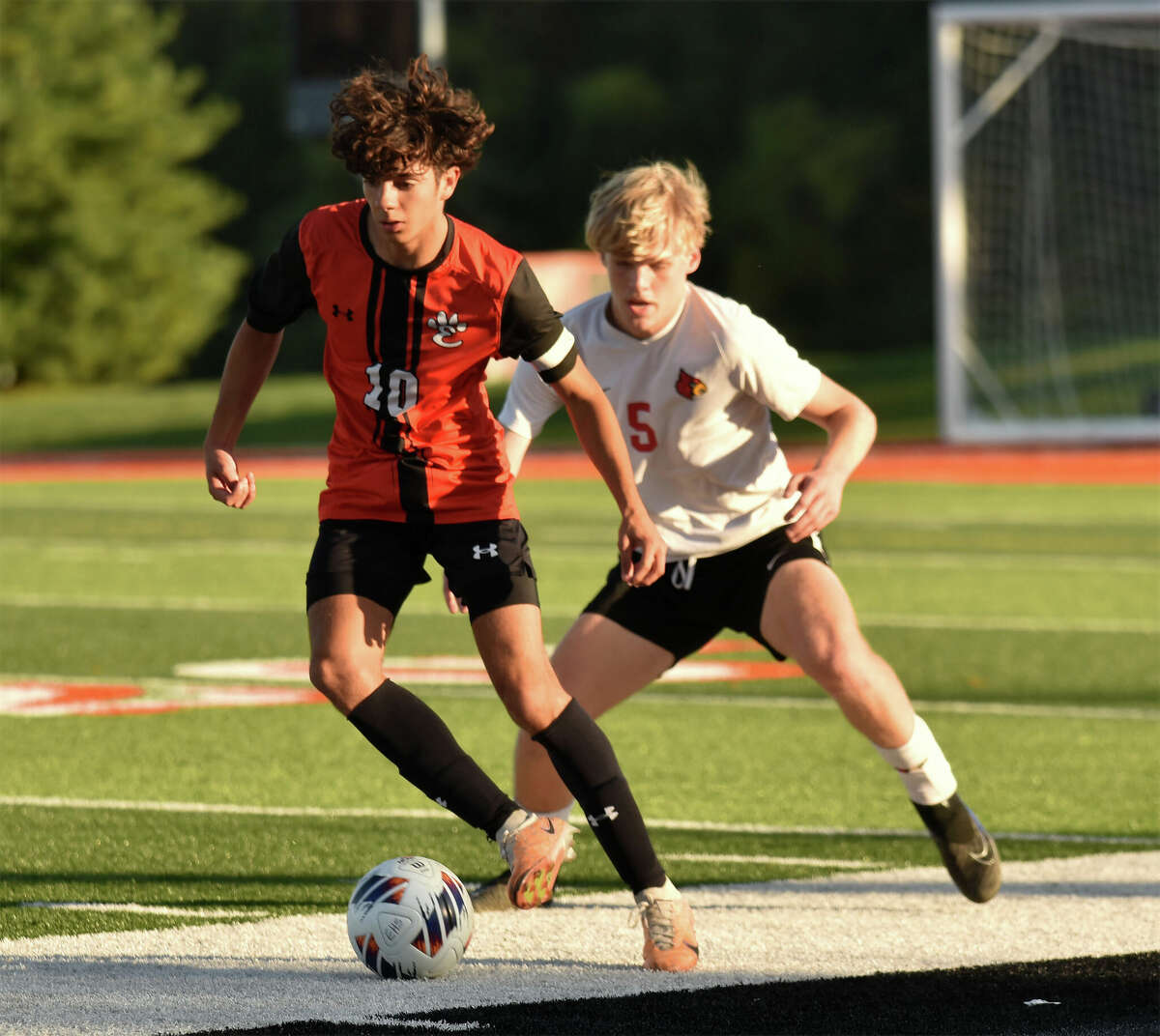 Tigers start postseason quick with Moore's two goals