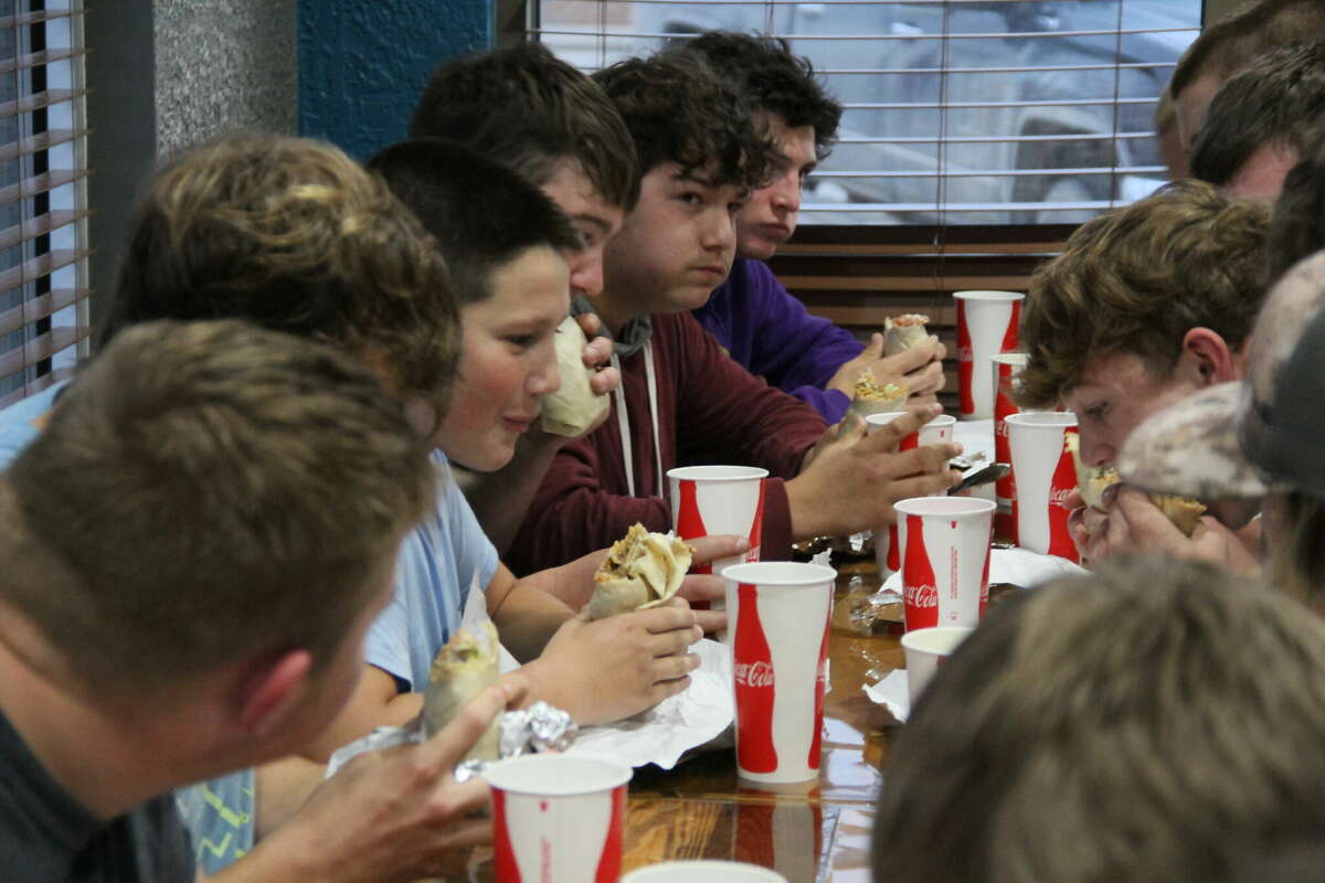 Lakers, Bad Axe compete in burrito eating contest at Lugo's