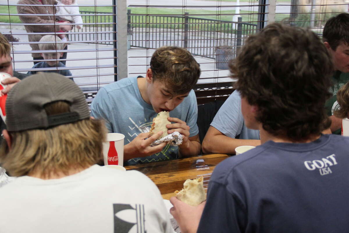 Lakers, Bad Axe compete in burrito eating contest at Lugo's