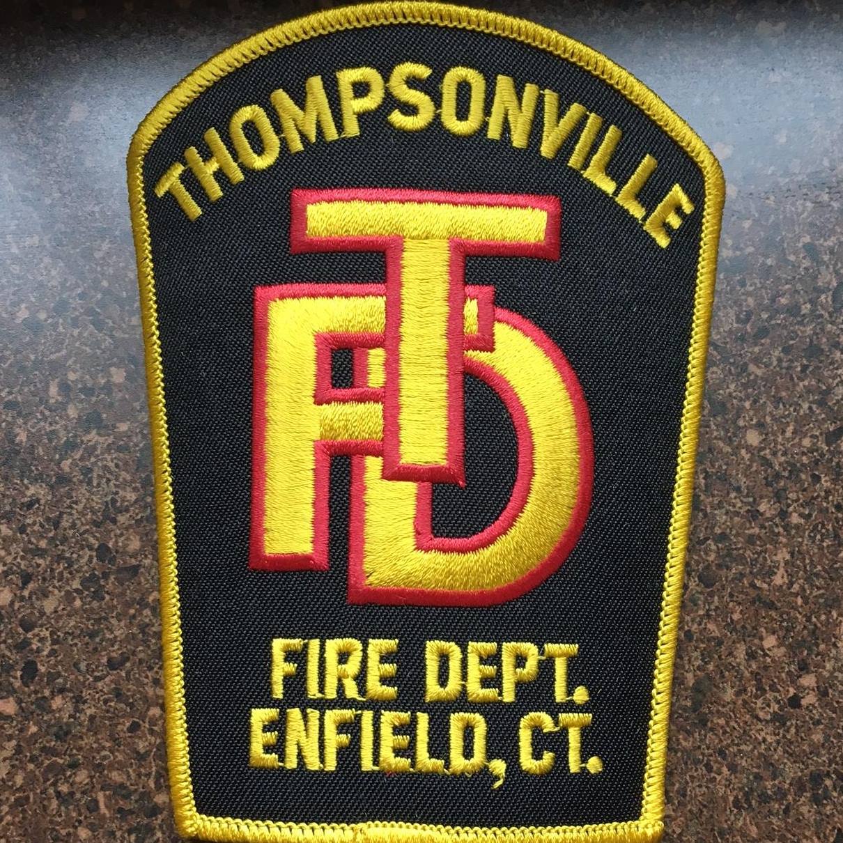 Firefighters work to put out blaze in Enfield, official says