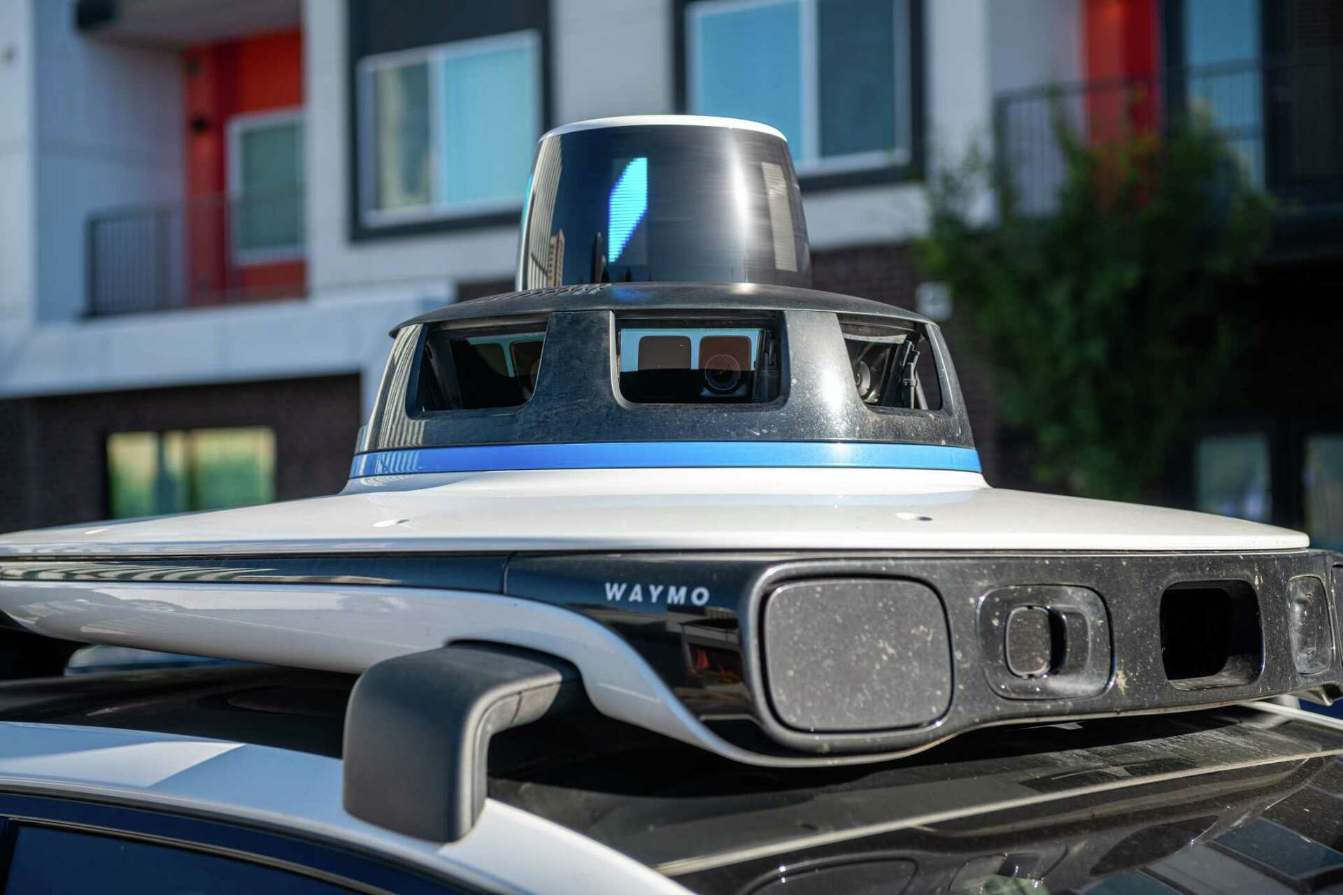 Waymo lays off more workers amid significant driverless taxi expansion