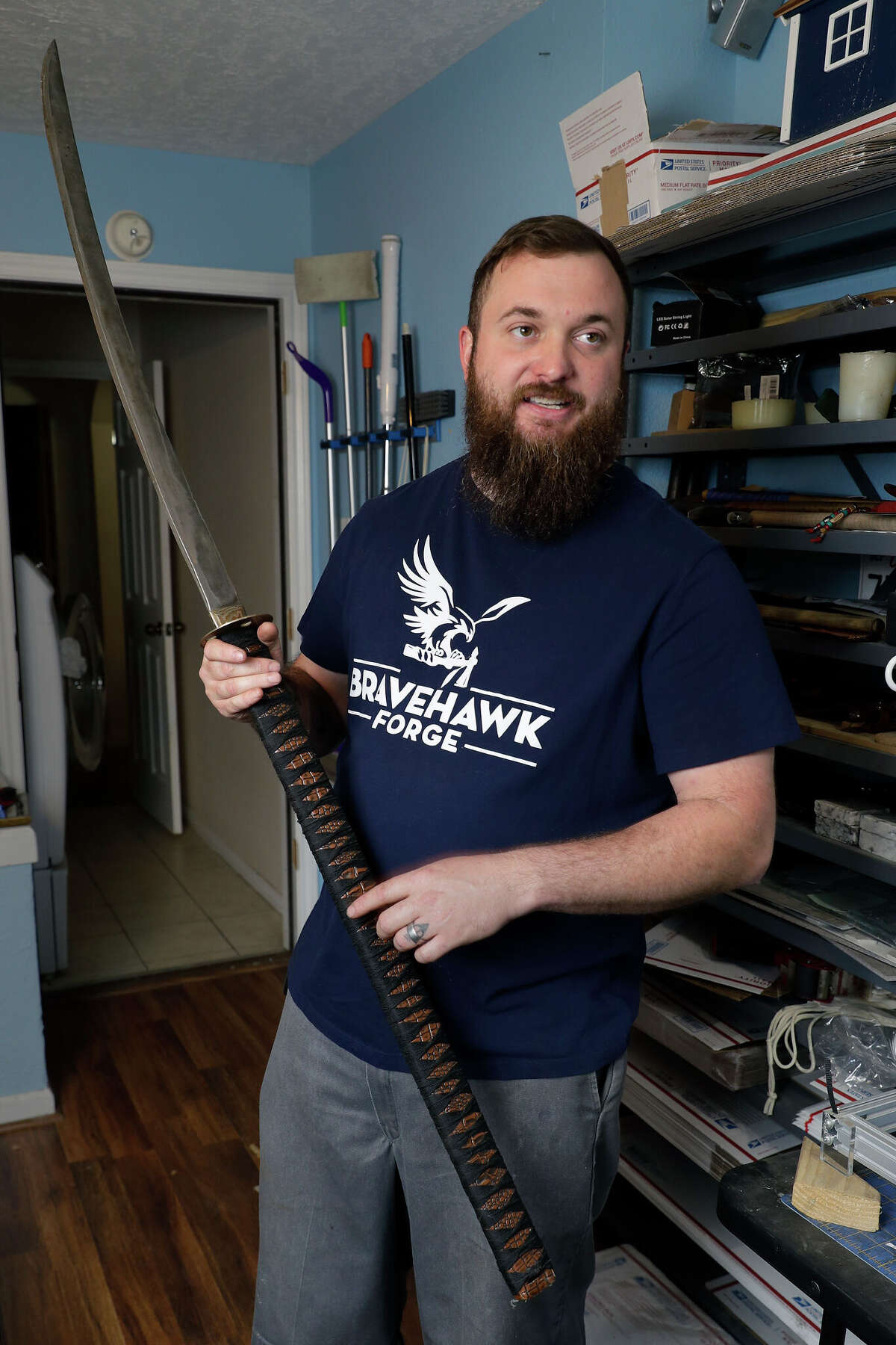 Conroe bladesmith Jacob Sewell makes custom tomahawks, swords, knives