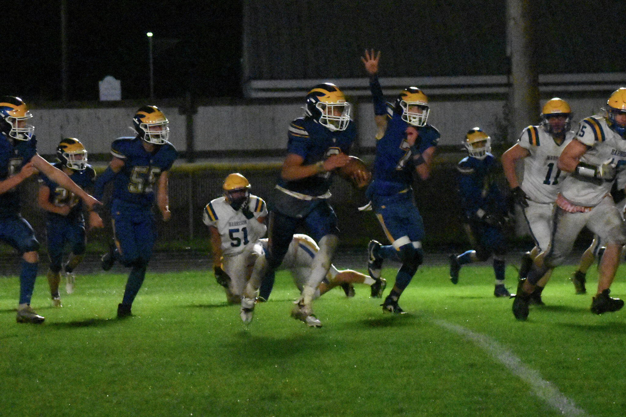 Evart football powers past Harrison while honoring local eighth grader
